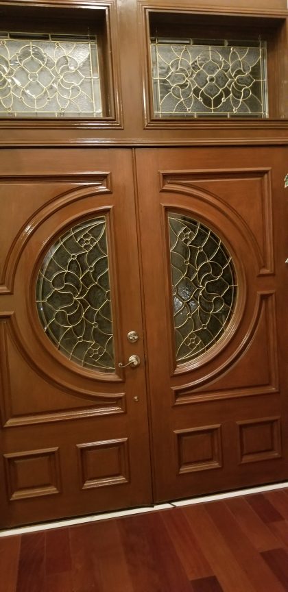 Victorian style brass came beveled windows made for a clients entryway