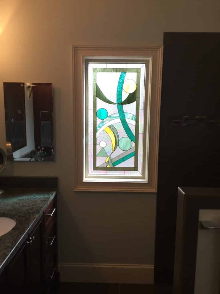 Abstract Geometric Stained Glass Window Installed In Kitchen