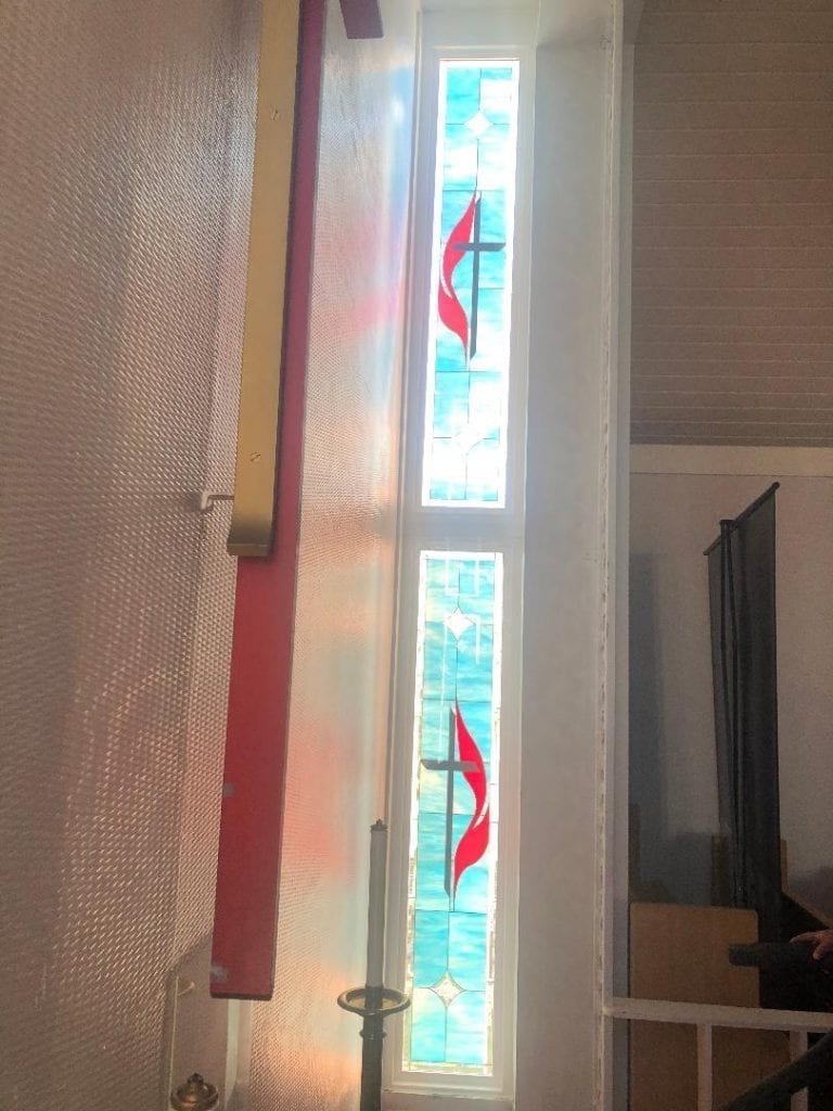 Methodist Cross Stained Glass Windows Installed In A Church