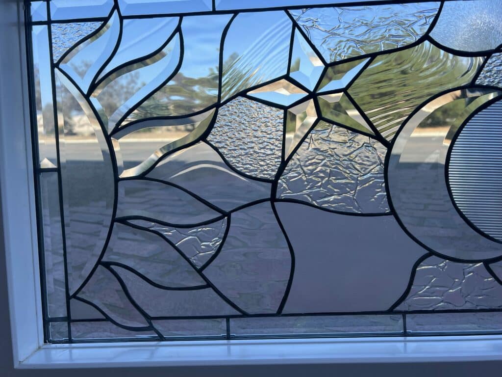 Vinyl framed and Triple Paned Beveled Sun, Moon & Star #2 Stained Glass Window